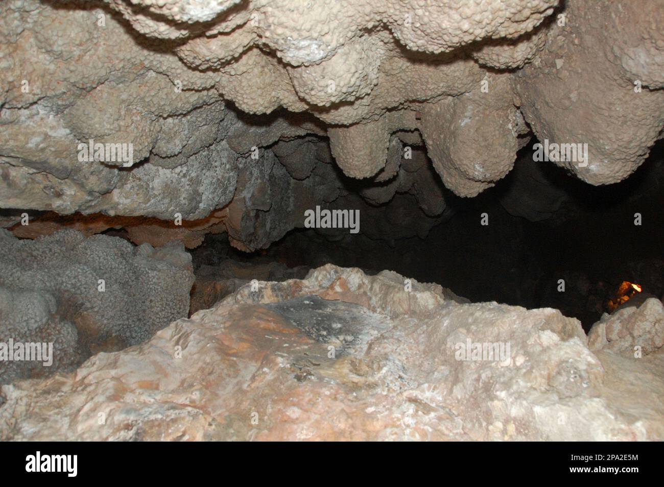 Calcite crystals are shown lining the walls of Jewel Cave National ...