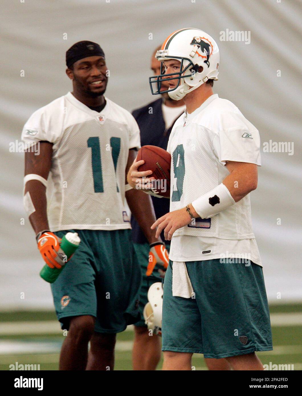 Miami Dolpins quarterback John Beck readys for a play during football ...