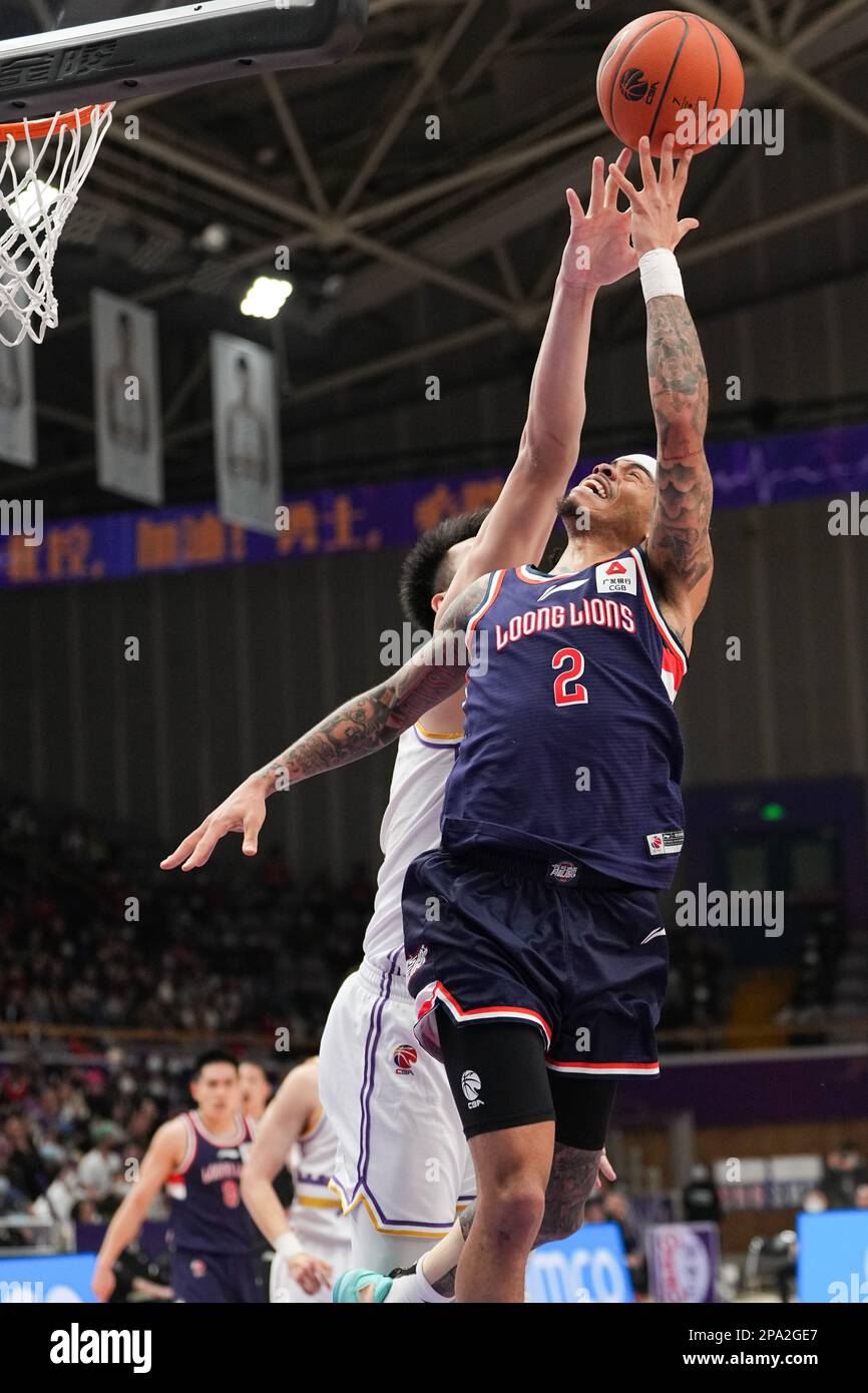 Beijing, China. 11th Mar, 2023. Nathaniel Mason (R) of Guangzhou Loong ...