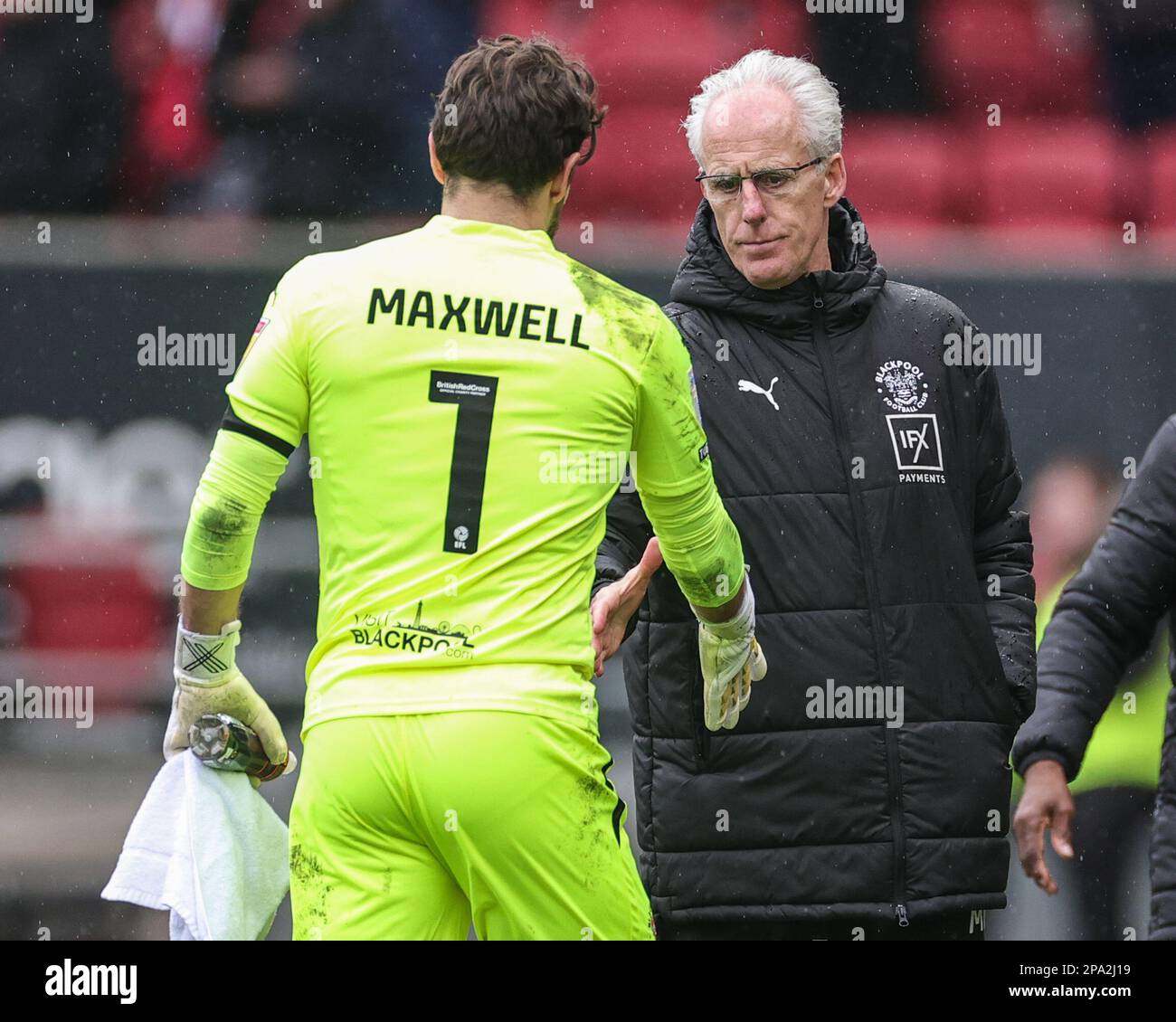 Bristol, UK. 11th Mar, 2023. Mick McCarthy manager of Blackpool shakes ...
