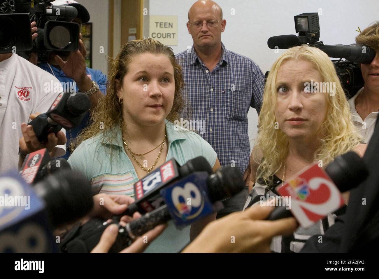 Mercades Nichols, center, and her mom Christina Garcia listen as their ...