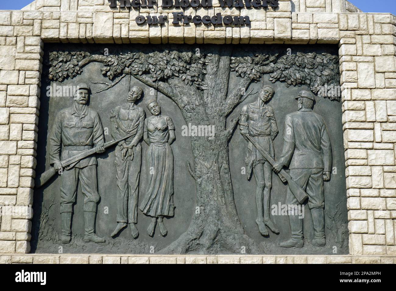 Relief on the front of the Genocide Memorial, Windhoek, Windhoek ...