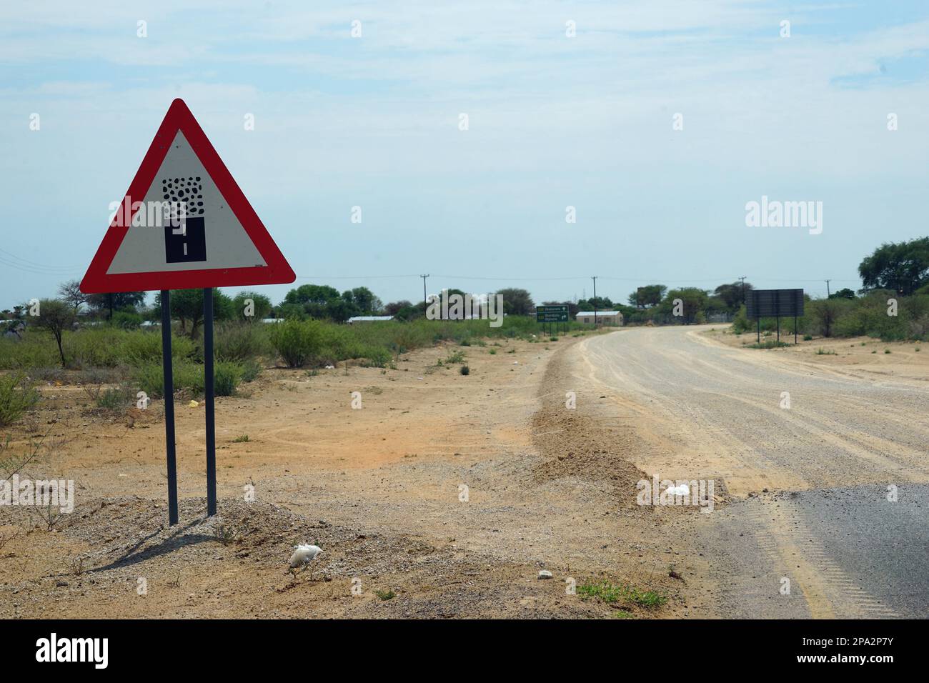 Sign, change from tarred road to dirt track, Okakarara, road C42 ...