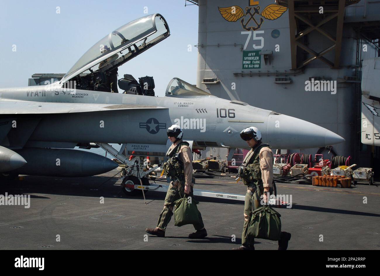 U.S Navy F/A-18 pilots prepare for a mission to Iraq from the USS ...