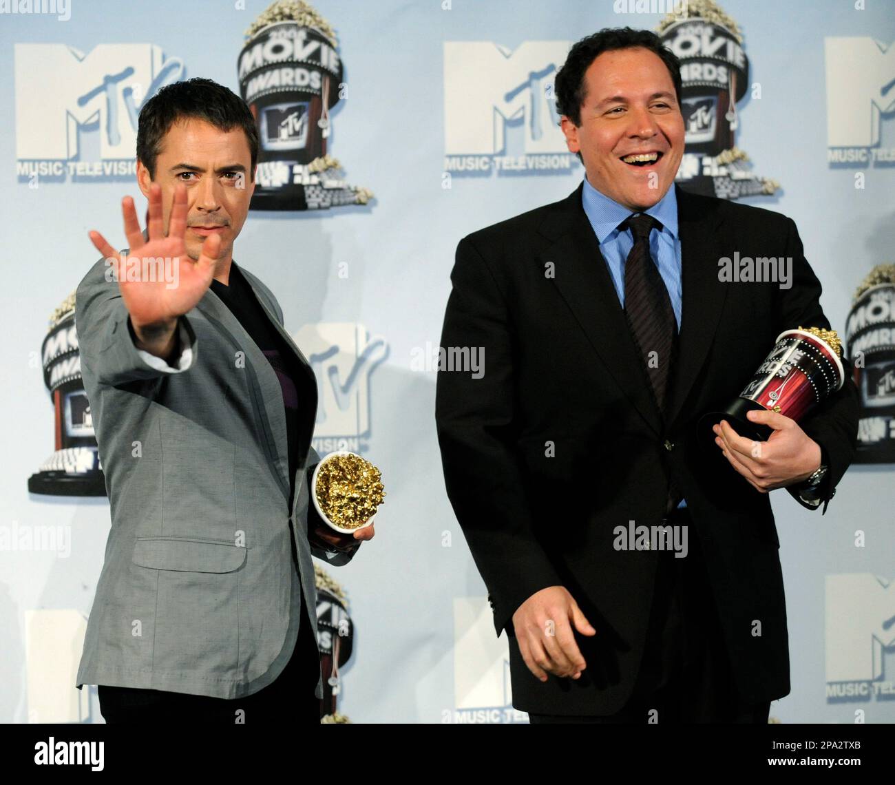 "Iron Man" cast member Robert Downey Jr., left, and director Jon ...