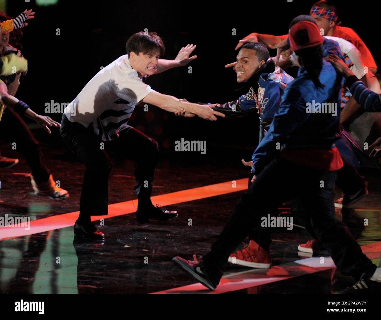 Chris Brown, right, and Mike Myers perform, at the MTV Movie Awards on ...