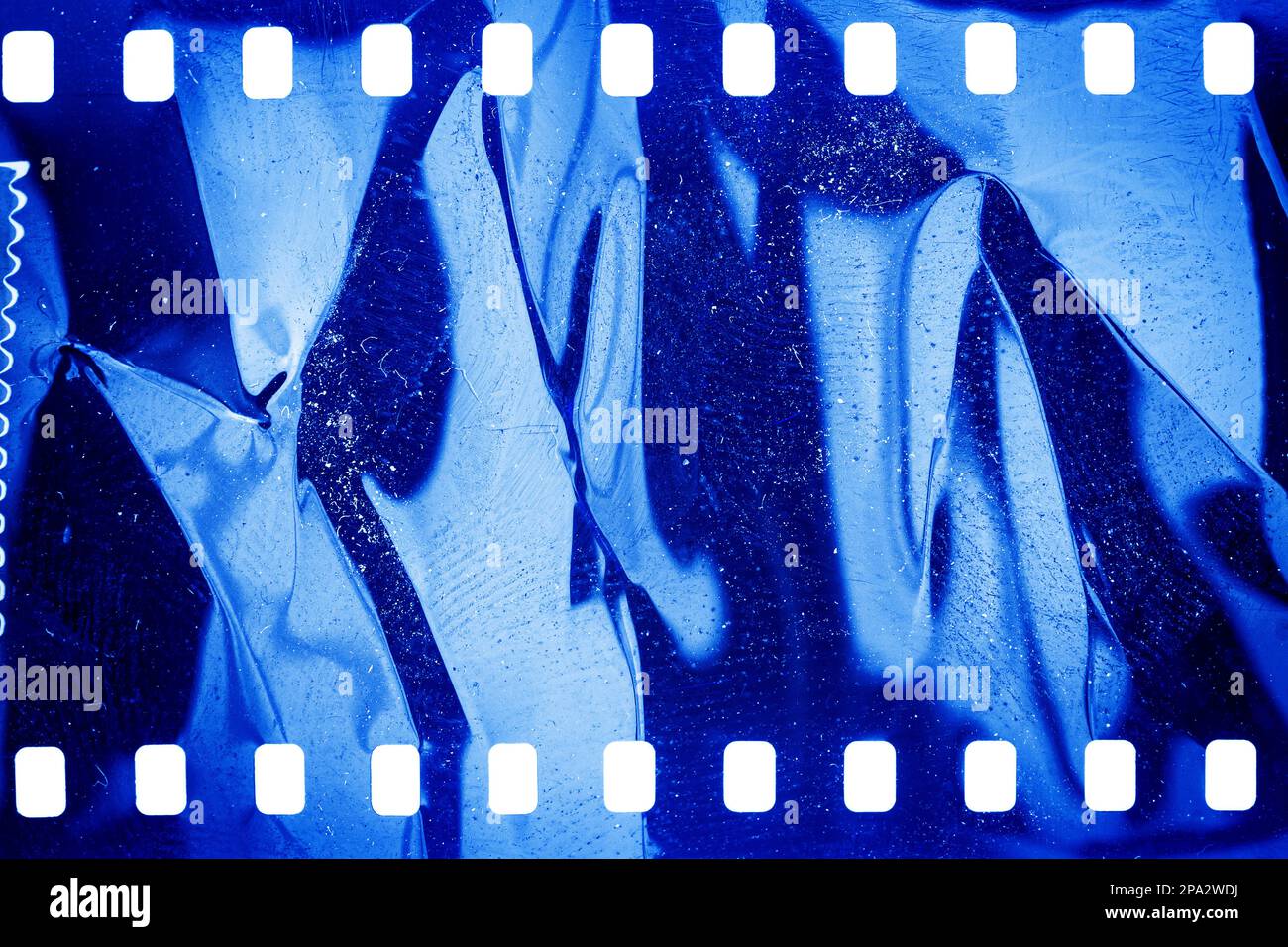Dusty and grungy 35mm film texture or surface. Perforated scratched ...