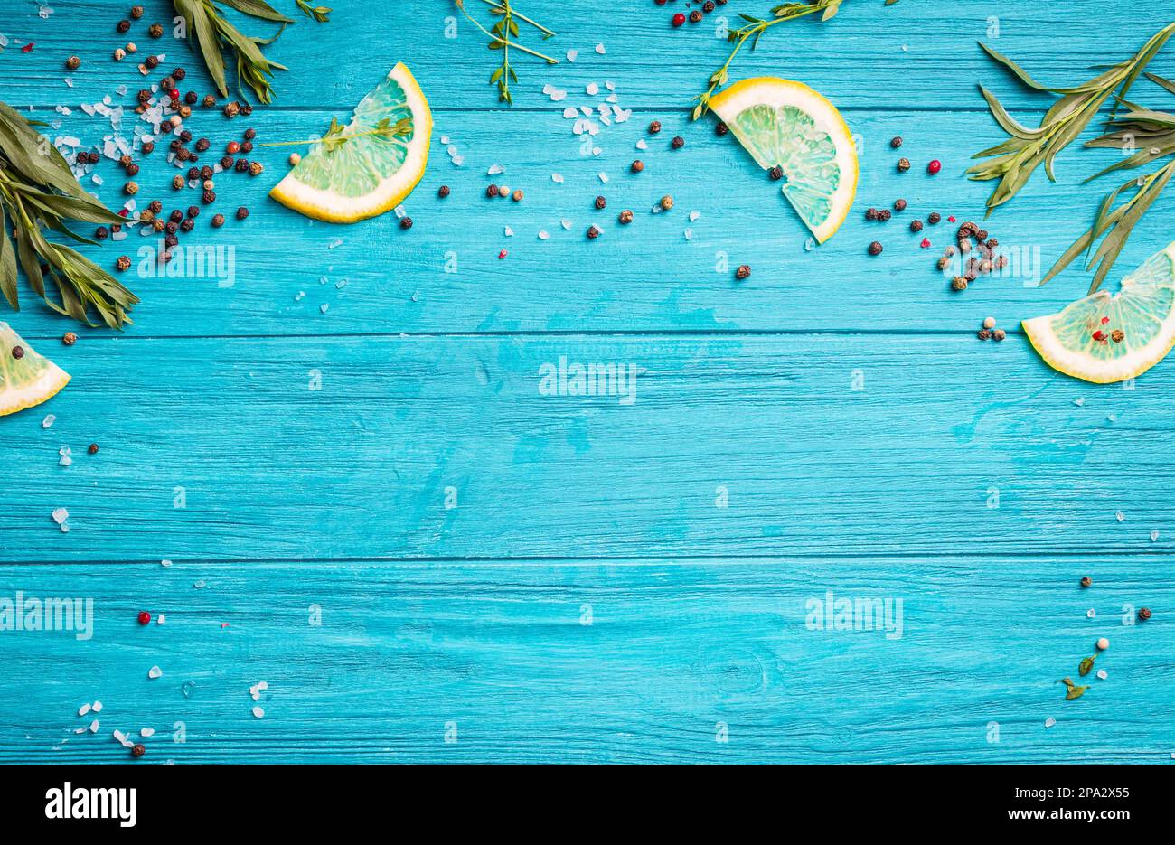 Food seasoning background. Blue coloured rustic wooden background ...