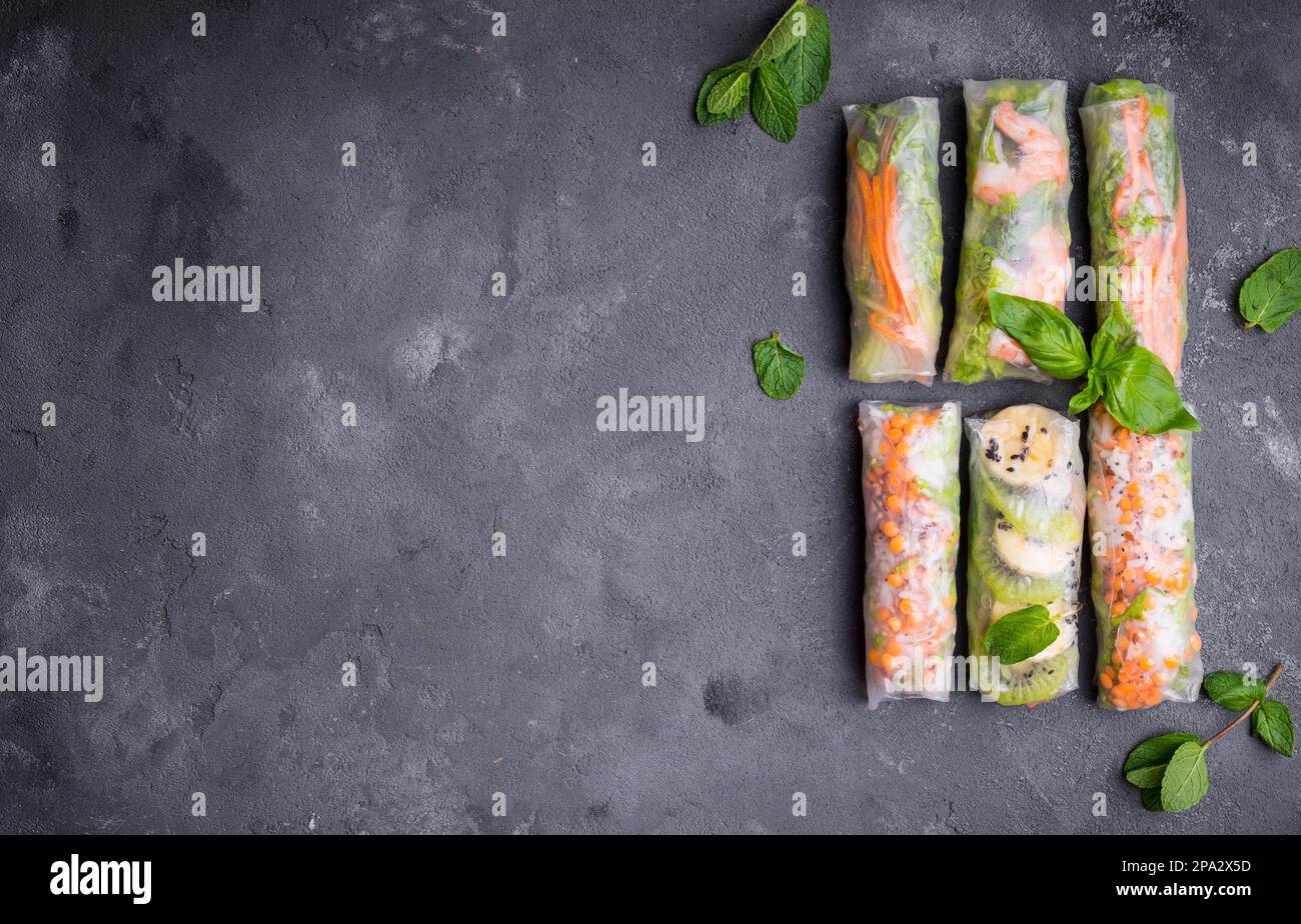 Fresh assorted spring rolls set background. Handmade asianChinese ...