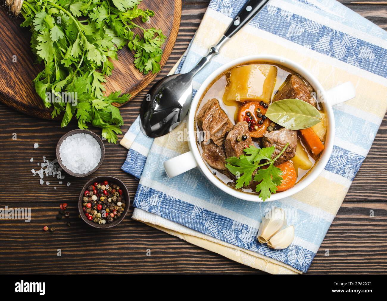 Close-up of slow cooked meat stew ragout in bowl with beef, potato ...
