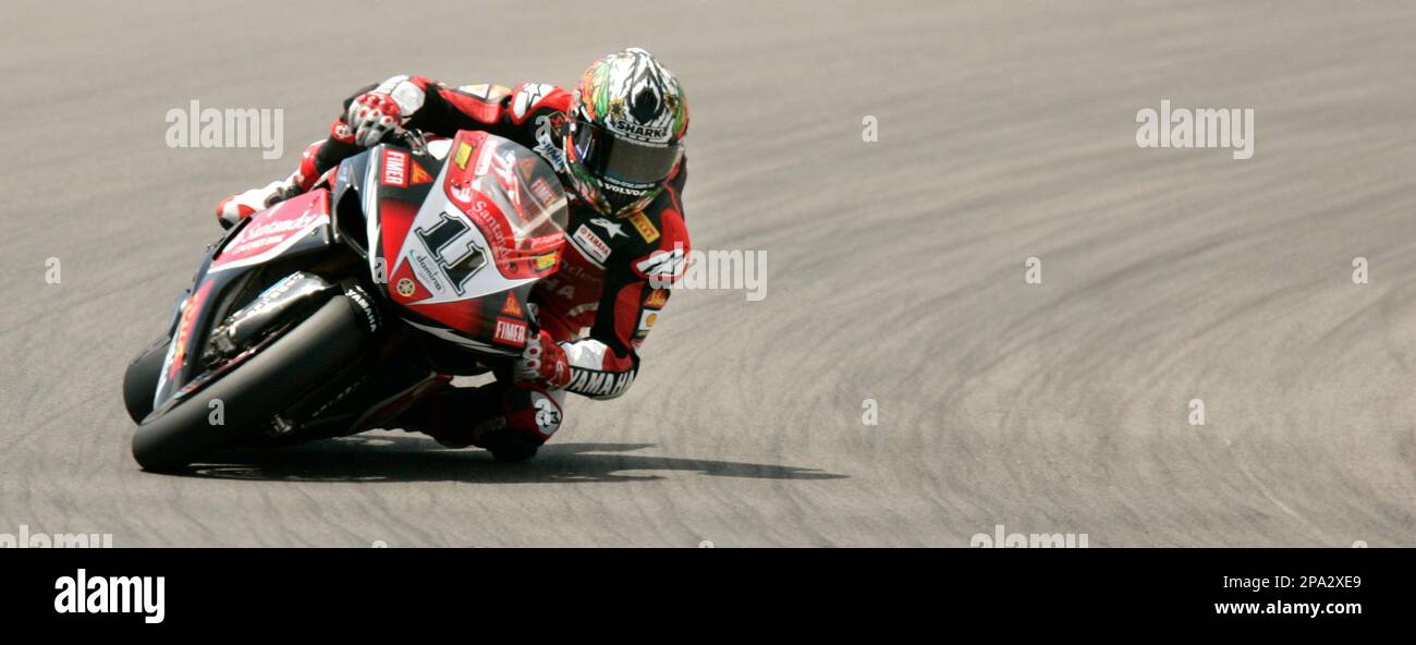 Australia's Troy Corser takes a turn during the AMA World Championship ...