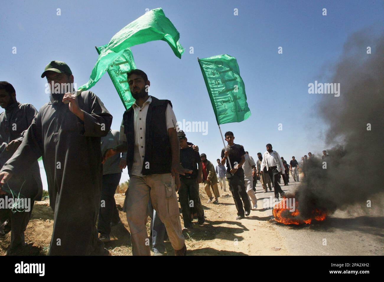** FOR STORY SLUGGED MIDEAST GAZA YEAR OF HAMAS ** Palestinians march ...