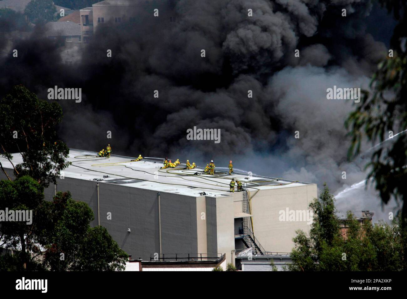 Los Angeles firefighters extinguish a fire at a building at Universal ...