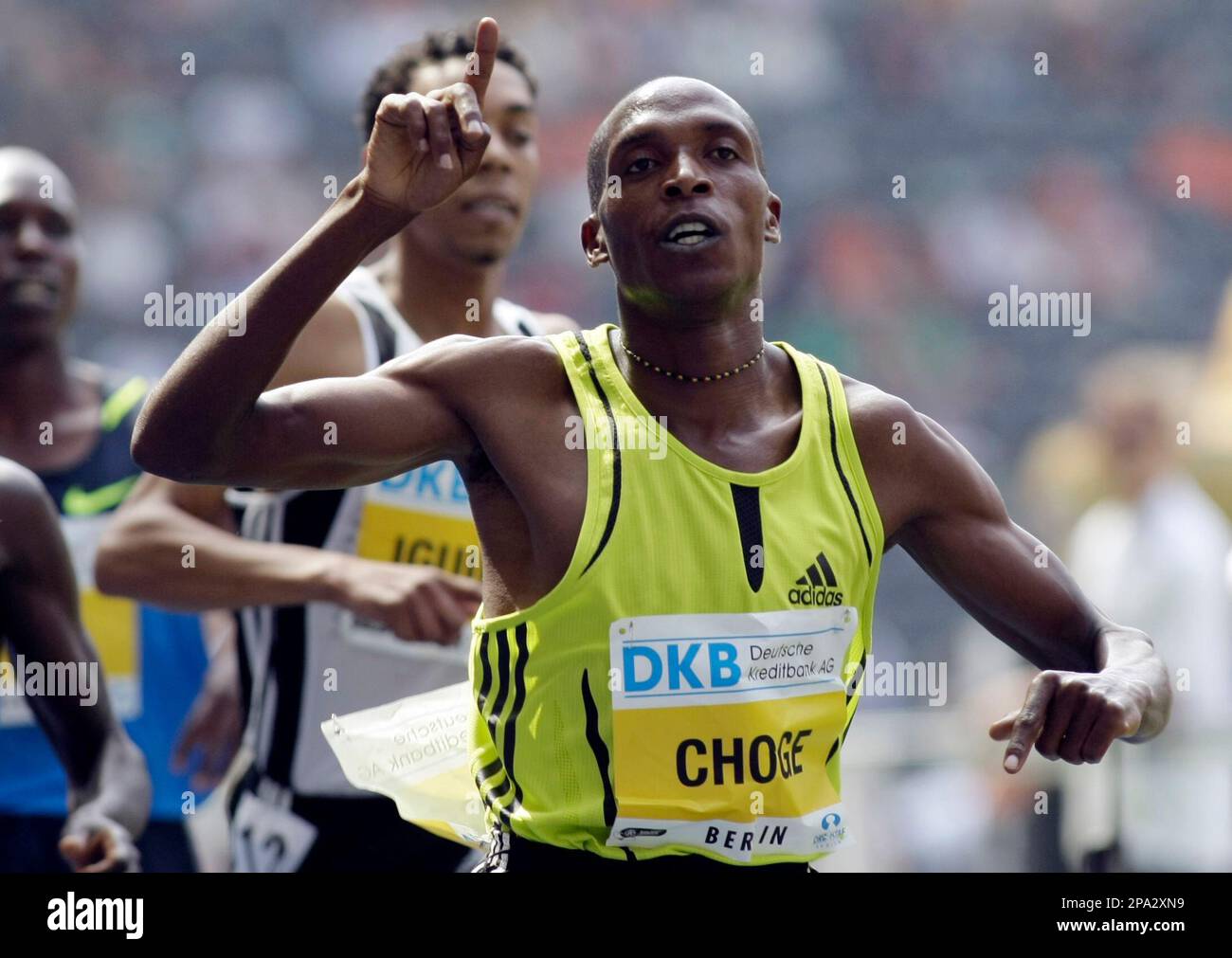 Augustine Kiprono Choge from Kenya jubilates as he crosses the finish ...