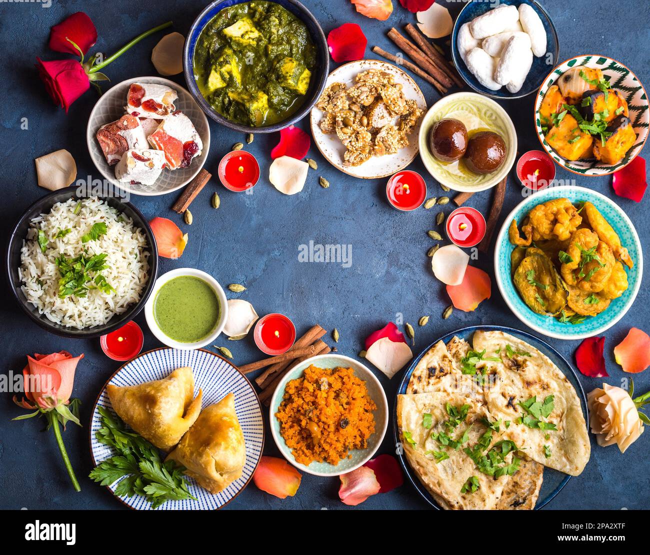 Festive food for Indian festival Diwali. Naan, samosa, rice, paneer ...