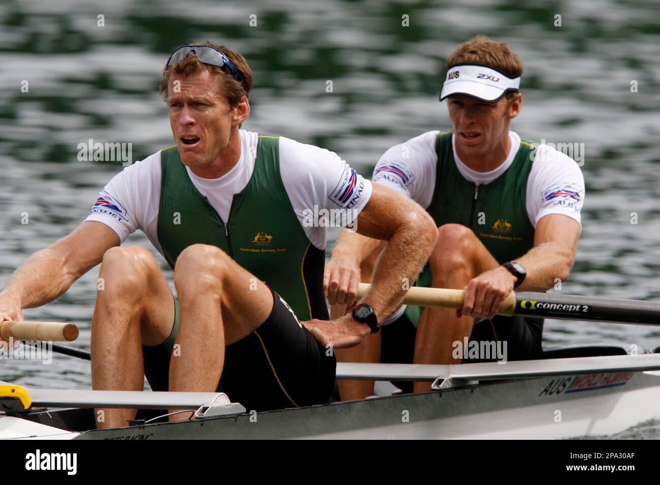 Australia's Duncan Free and Drew Ginn, from left, react after placing ...