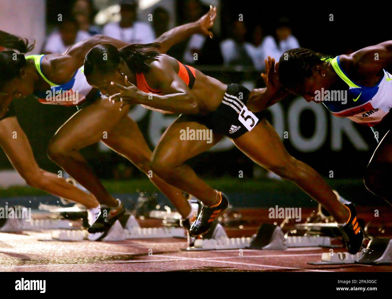 Jamaica's Veronica Campbell-Brown (5) leaves the starting block on her ...