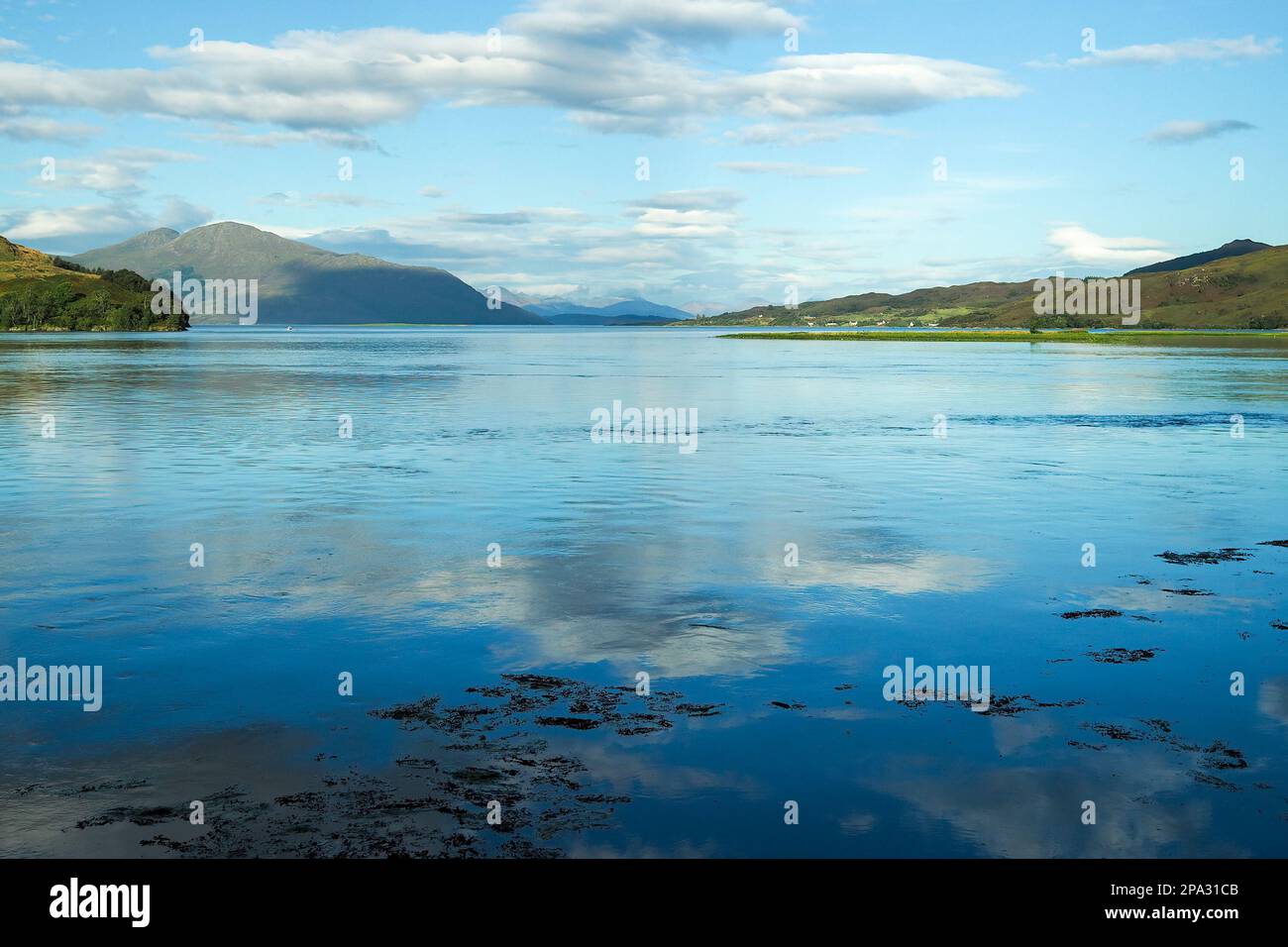 Scottish Lochs Duich lake on a beautiful summer day. Blue sky and soft ...