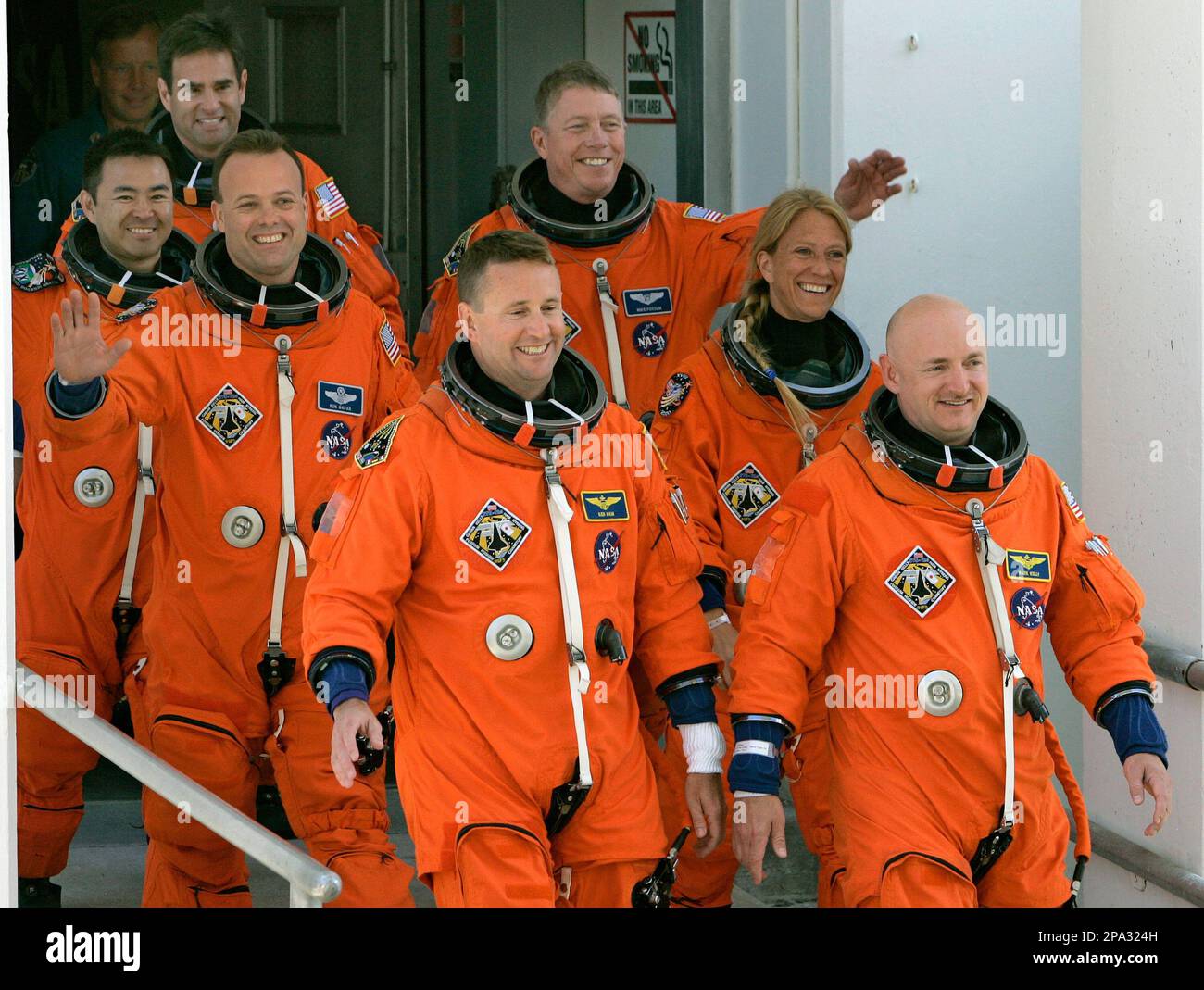 STS-124 crew members, front row from right, Commander Mark Kelly, Pilot Ken Ham, second row from ...