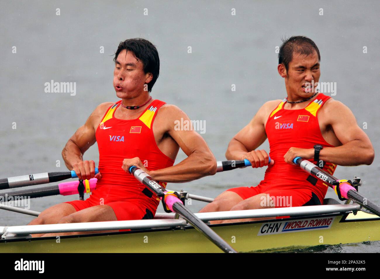 China's Liang Zhang and Hui Su, from left, on their way to place first ...