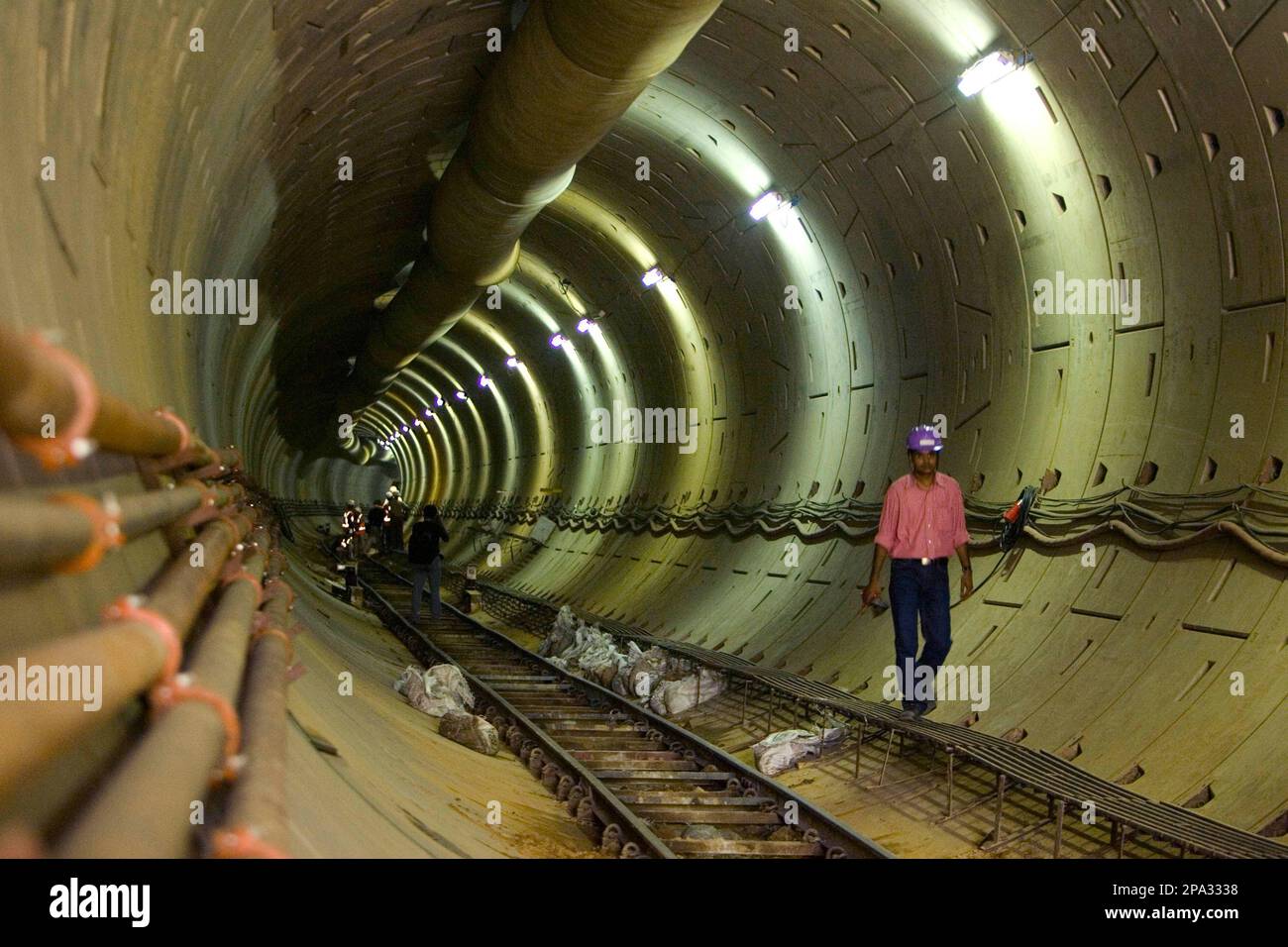 Media personnel take images of an underground section of the Delhi ...