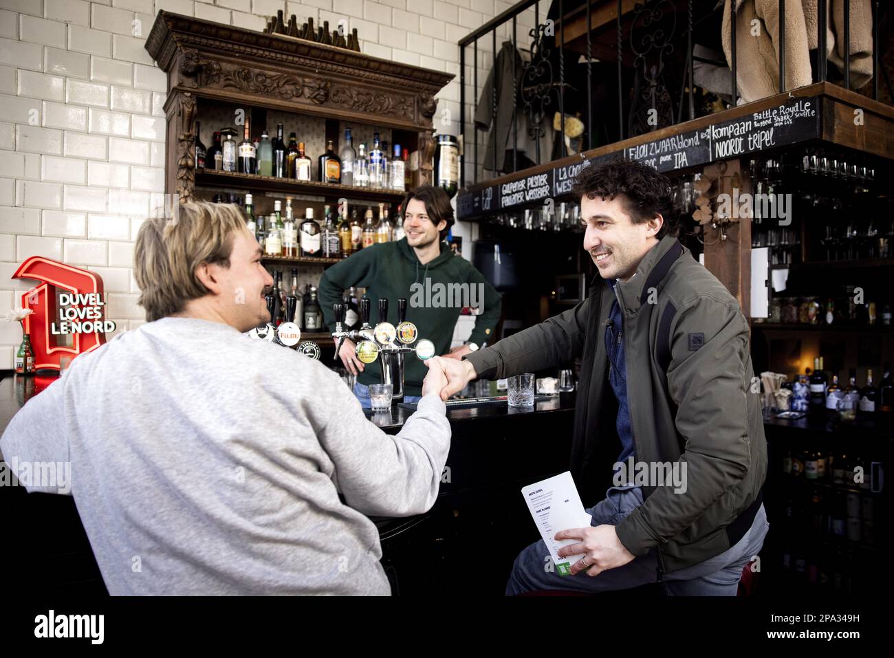 ROTTERDAM - GroenLinks leader Jesse Klaver is handing out flyers in ...