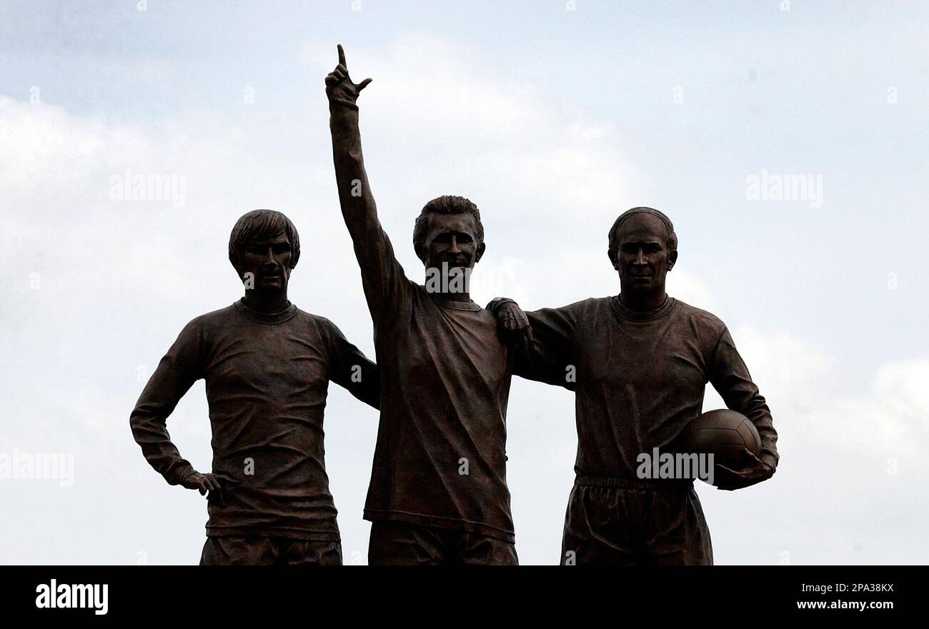 A general view of Manchester United's newly unveiled statue of, left to ...
