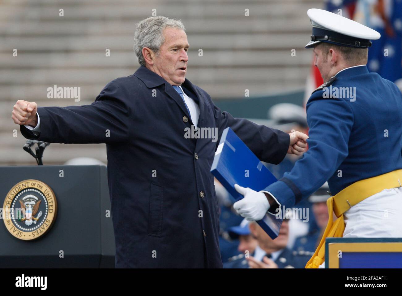 FIRST IN A SERIES OF THREE *** President Bush and graduate Theodore ...