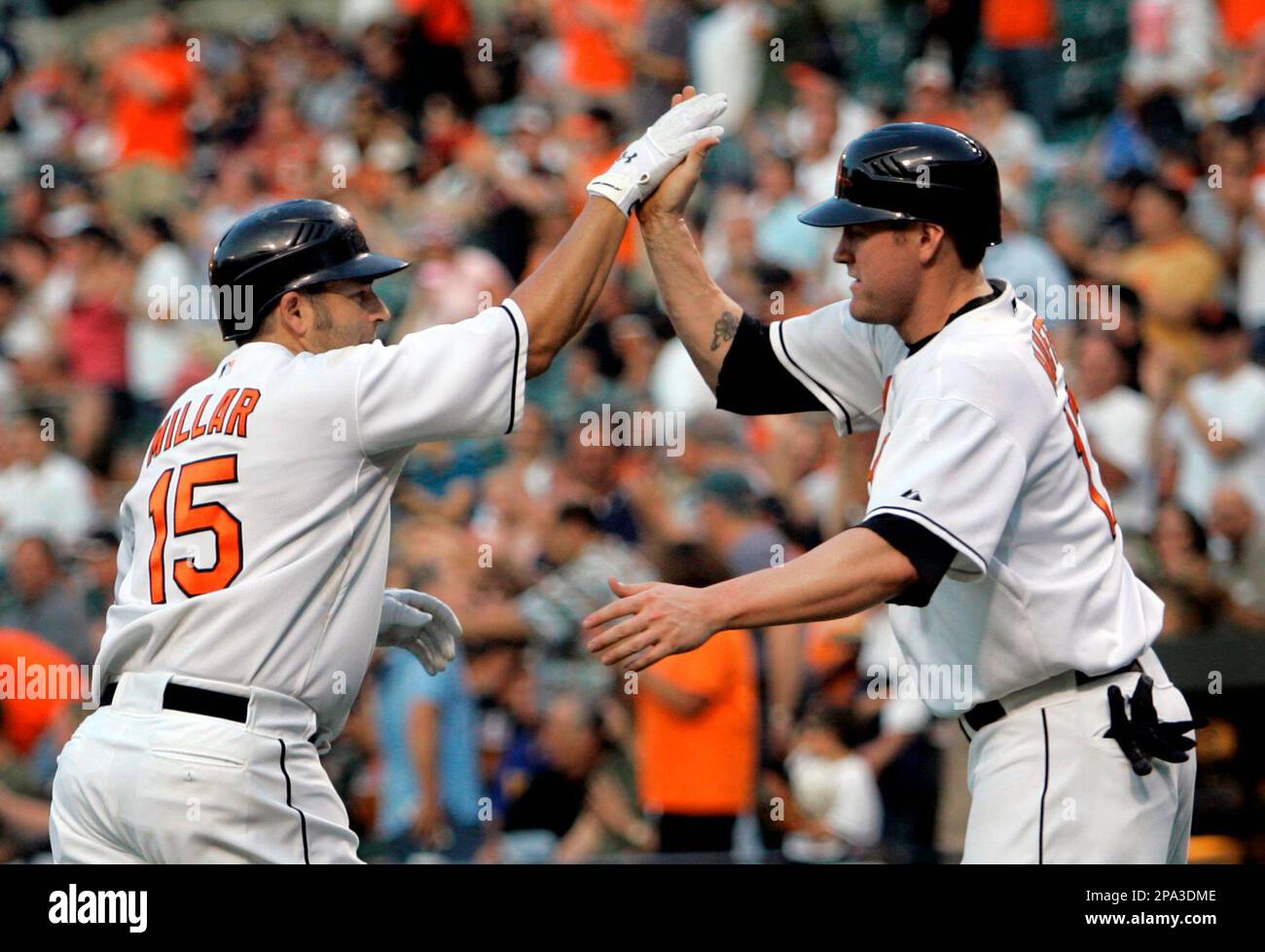 Baltimore Orioles' Kevin Millar, left, celebrates with teammate Aubrey ...