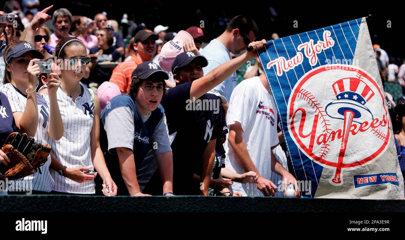 New York Yankees' fans watch the team take batting practice before the ...