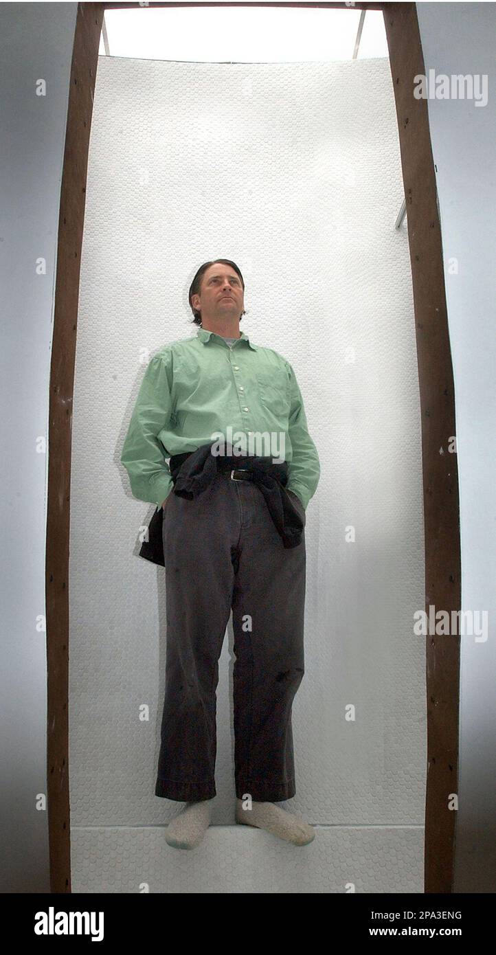 Architect William Massie stands inside the oval shower with a skylight in his "American House ...