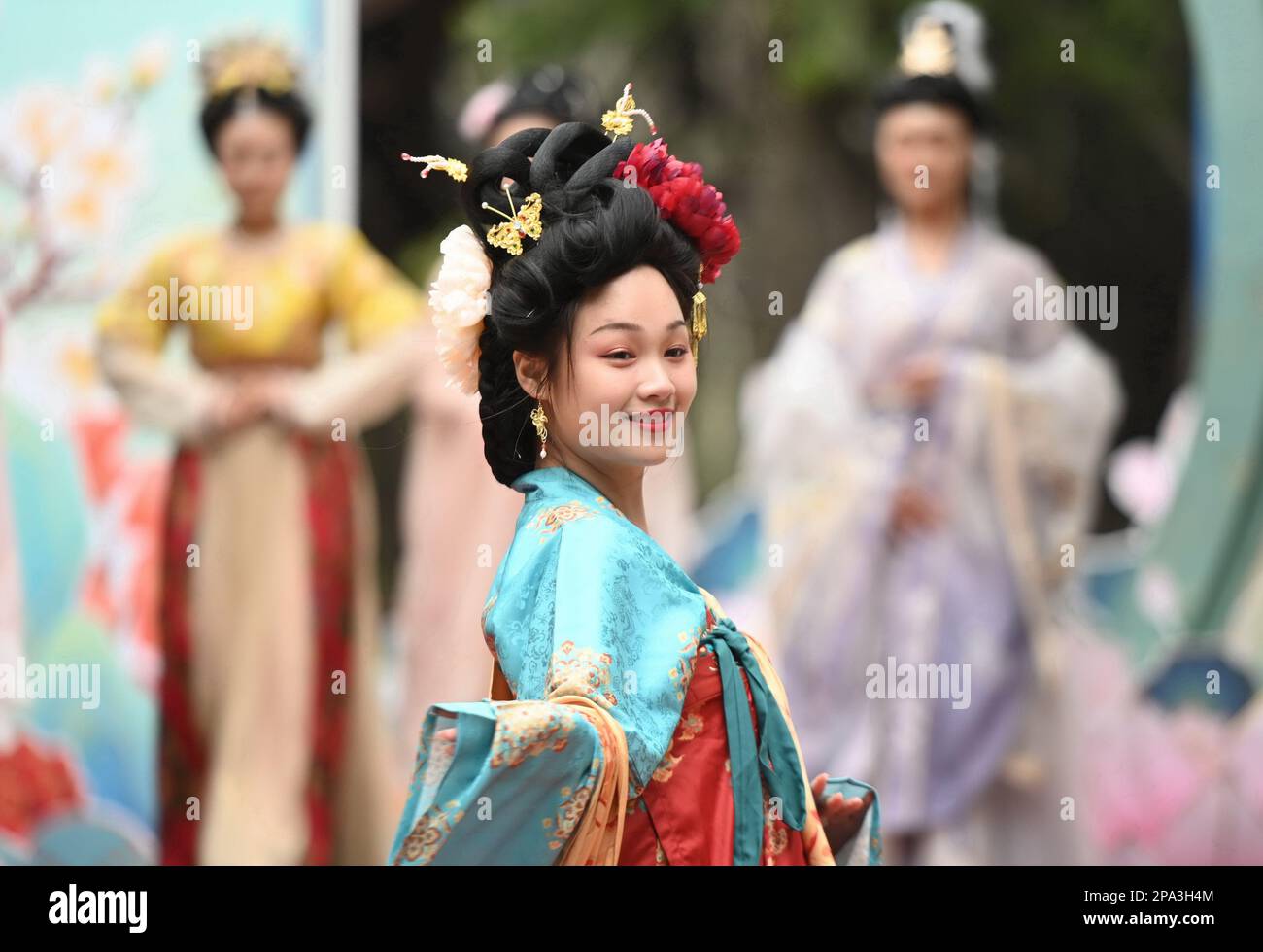 Fuzhou, China's Fujian Province. 11th Mar, 2023. A performer displays ...