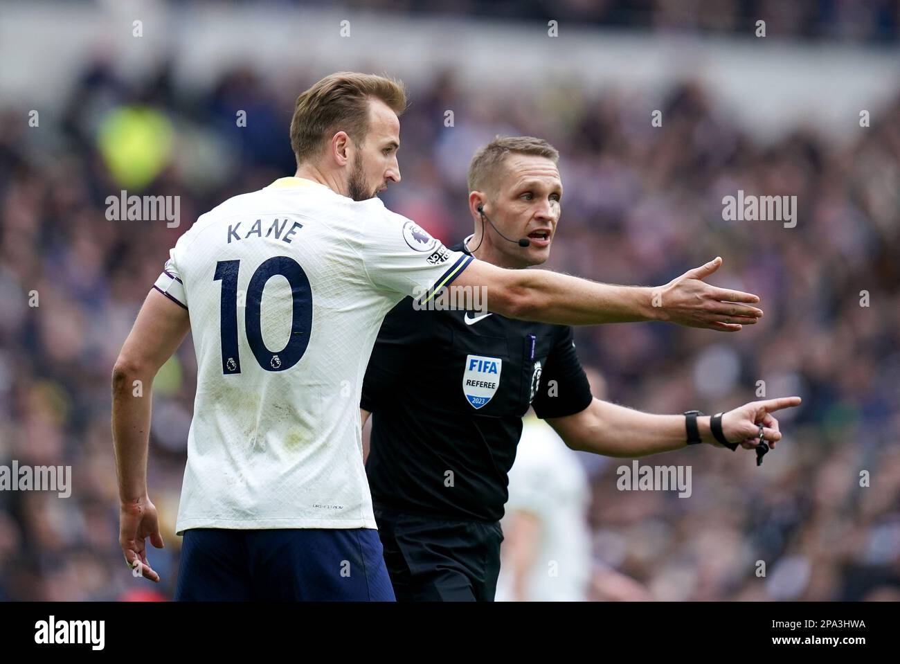 Tottenham Hotspur's Harry Kane speaks with referee Craig Pawson during ...