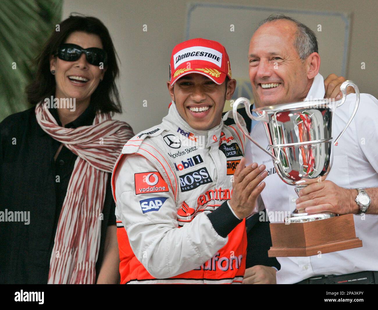 McLaren Mercedes driver Lewis Hamilton of Britain, center, celebrates ...