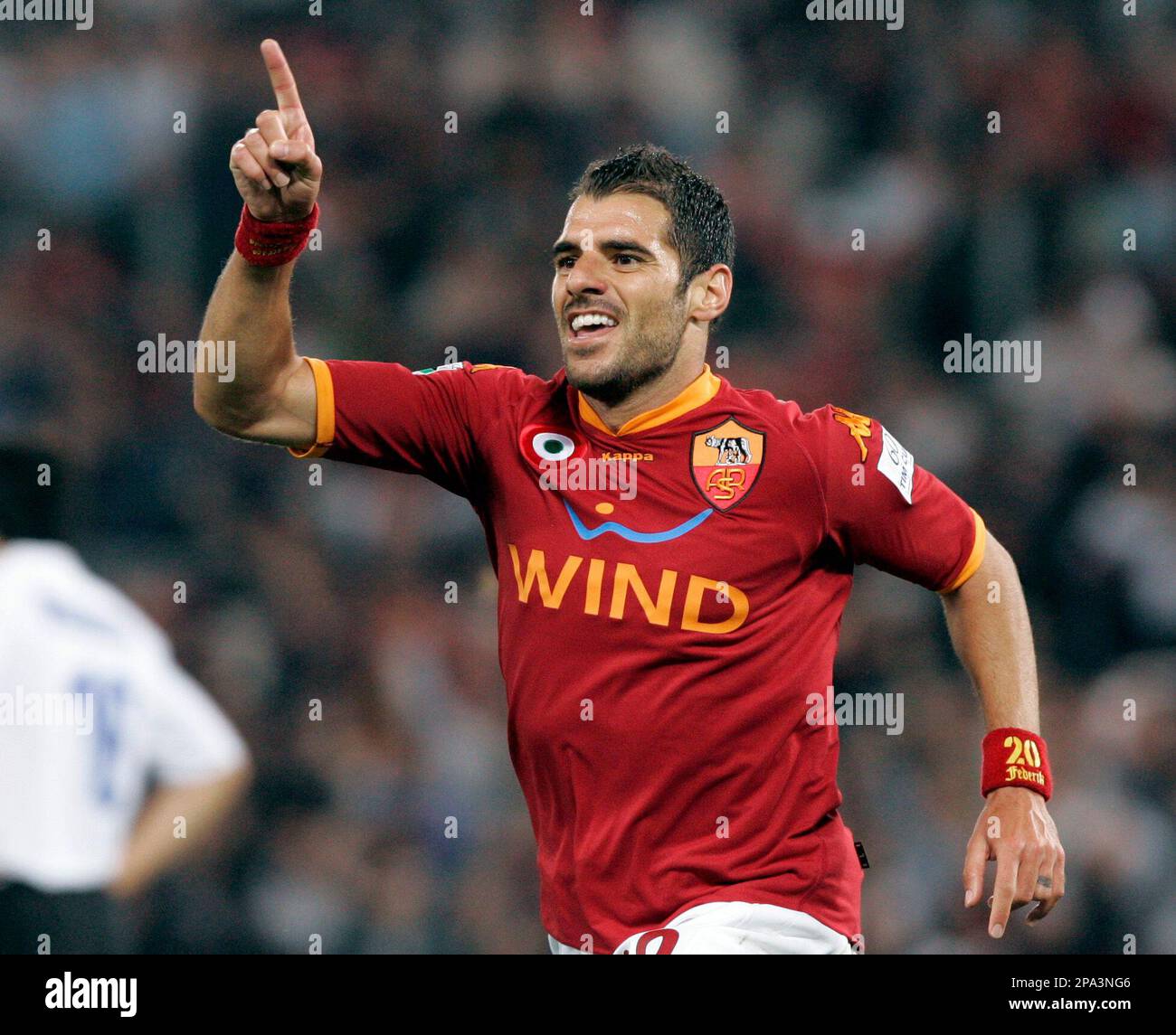 AS Roma midfielder Simone Perrotta celebrates after scoring, during the ...