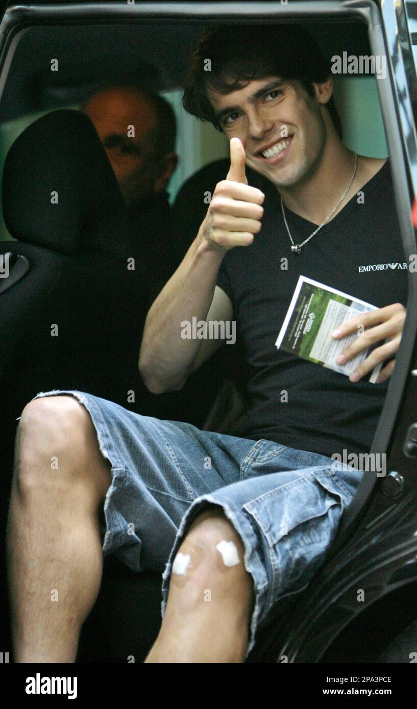 AC Milan's Kaka of Brazil gives a thumbs up as he leaves the Pasteur ...