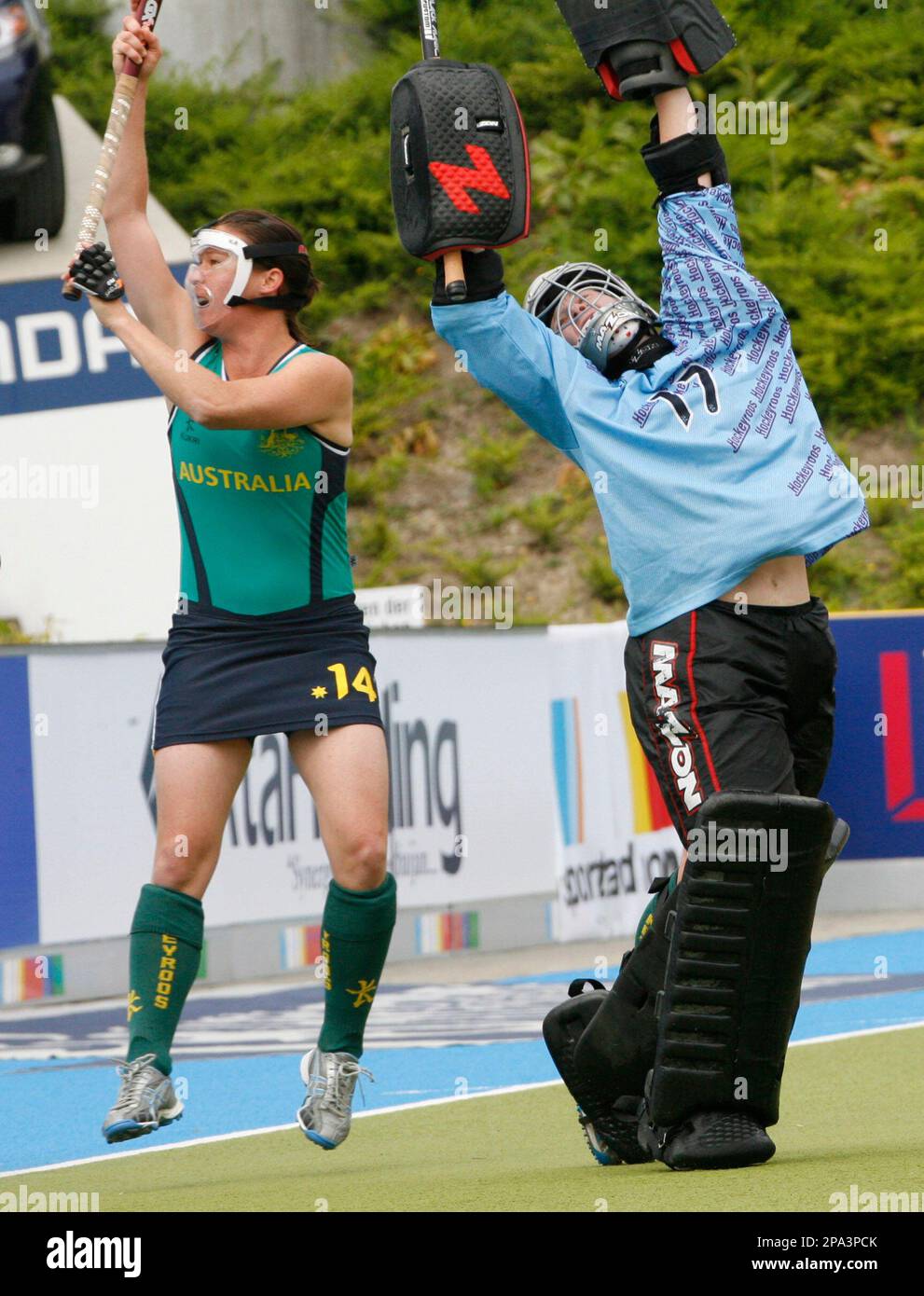 Australia's keeper Rachel Imison and Jessica Arrold jump to the ball in ...