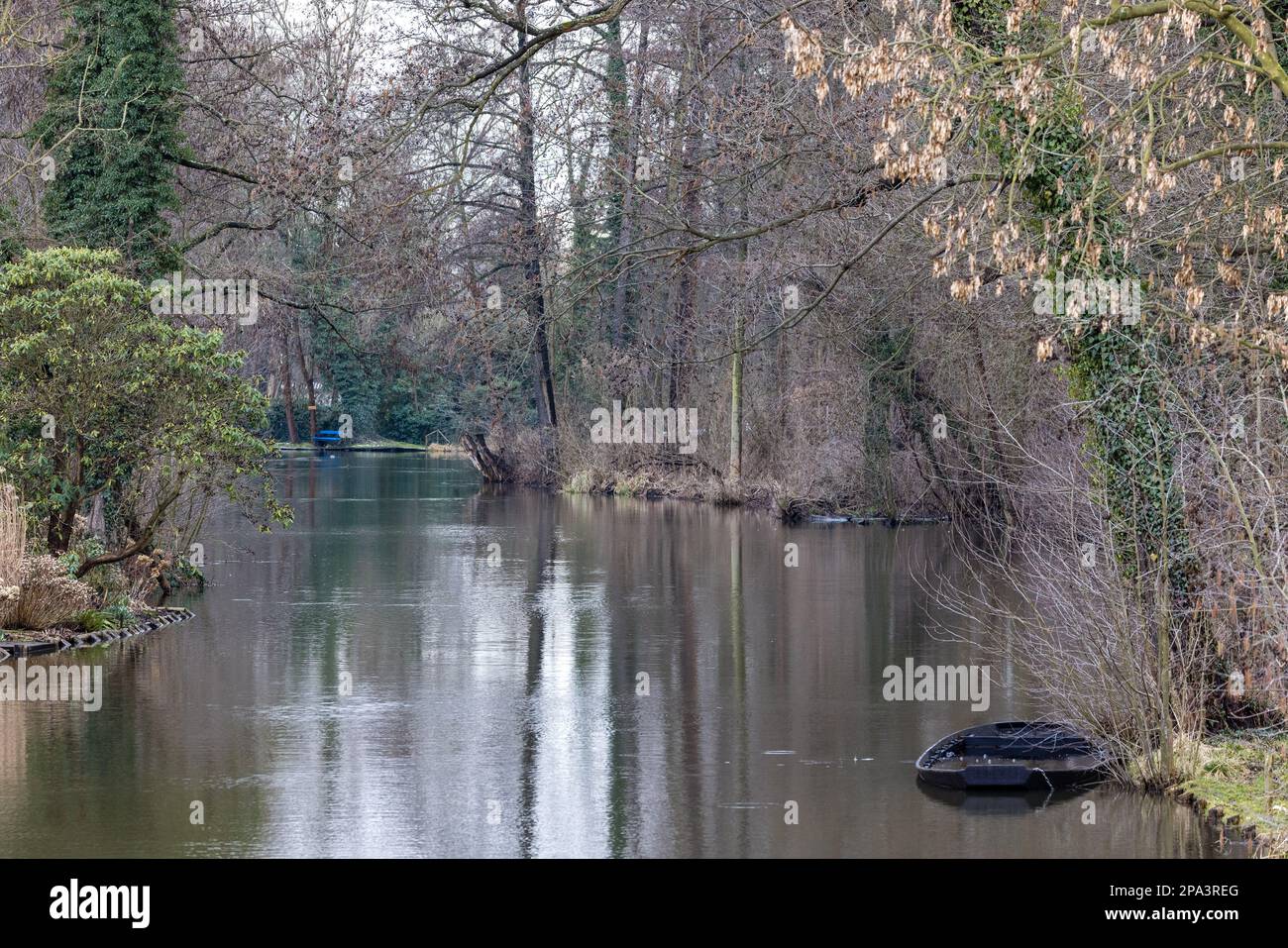 Lehde, Germany. 11th Mar, 2023. Only one empty barge lies on a river ...