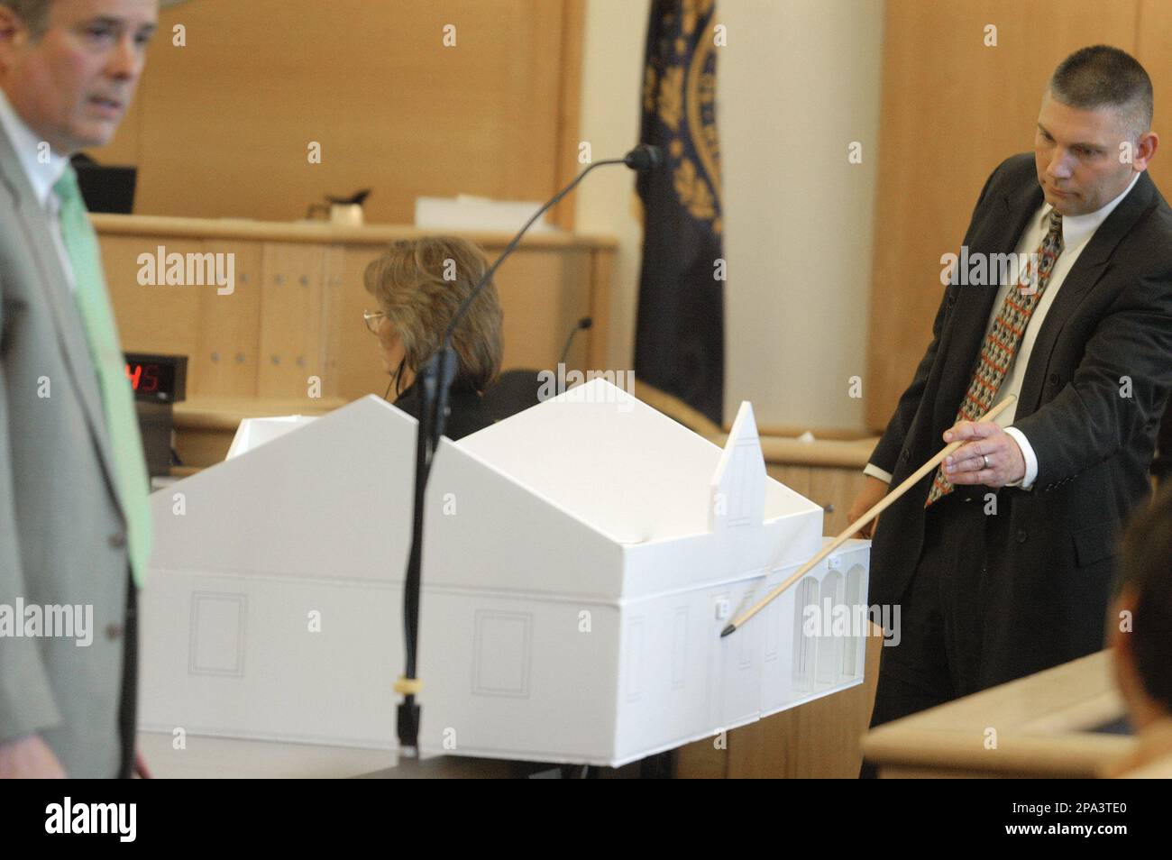 Epping, N.H. Police Sgt. Sean Gallagher , right, points to a mock-up of ...