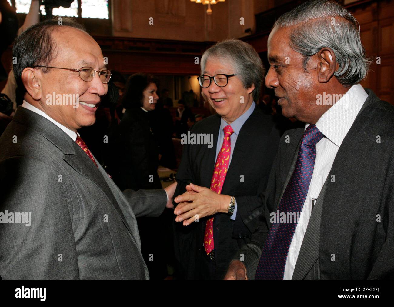 Malaysia's Foreign Minister Rais Yatim, left, Singapore's Deputy Prime ...
