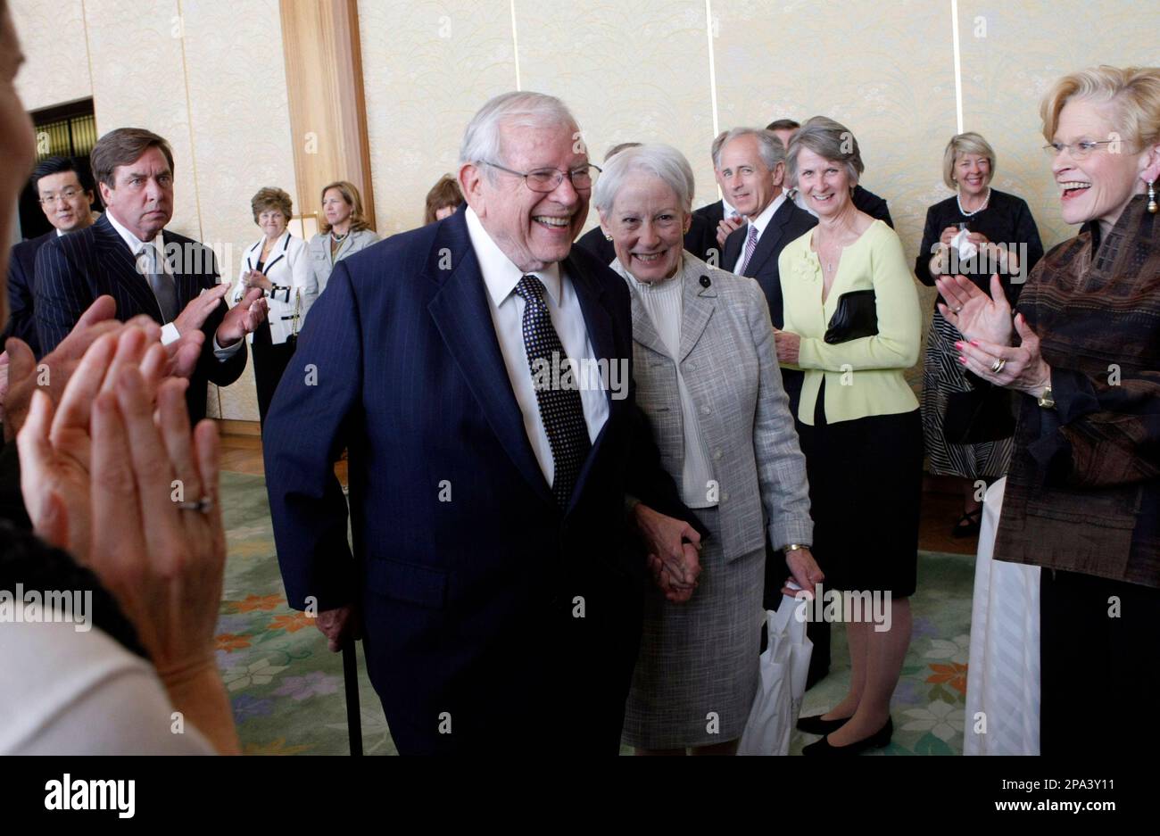Former U.S. Ambassador to Japan, Howard Baker, left, walks in with his ...