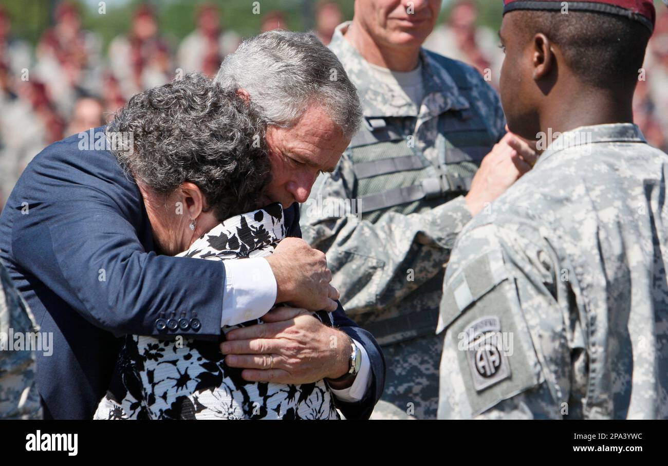 President Bush embraces Barbara Walsh, the mother of Sgt. 1st Class ...