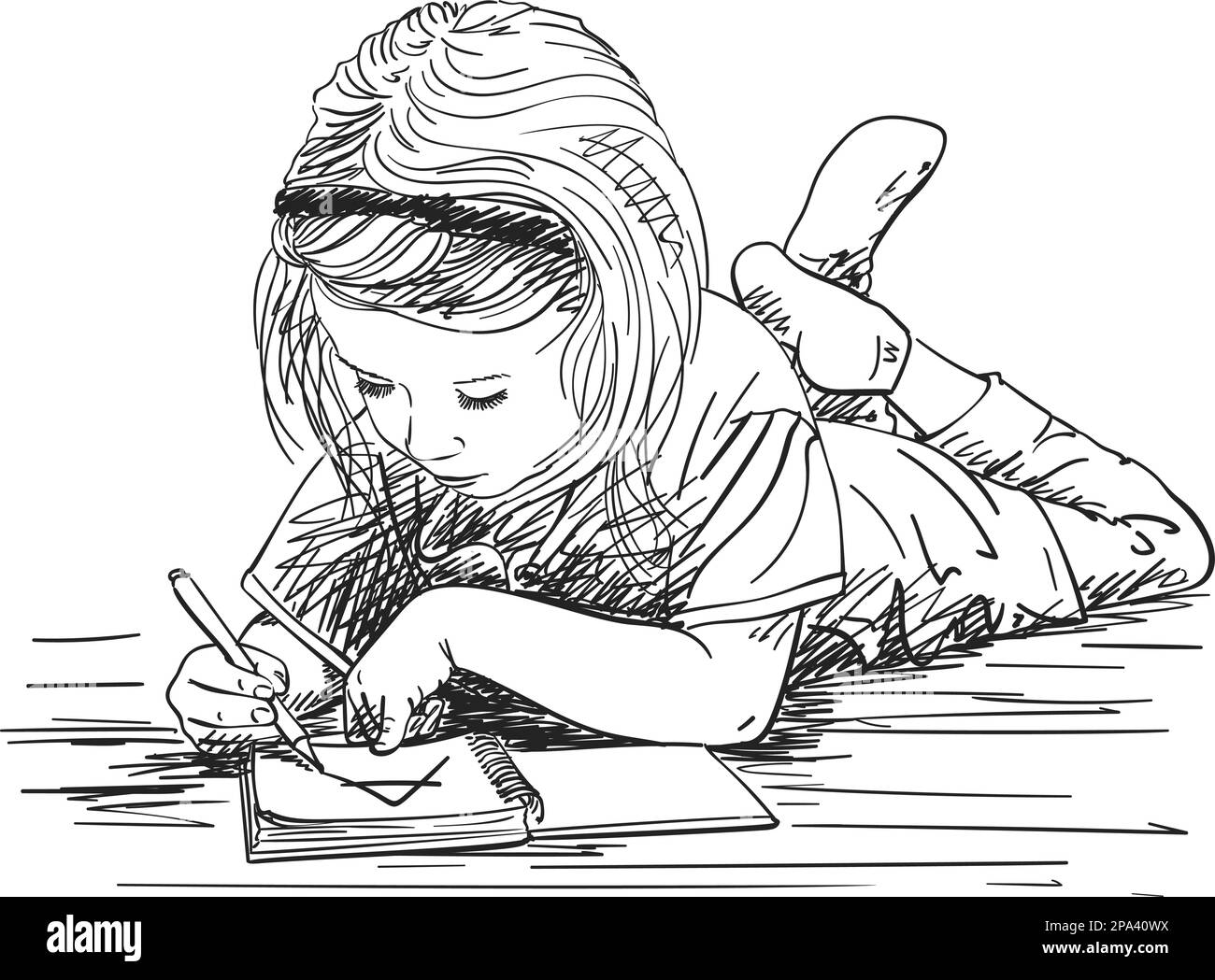 Child girl writing in note book big A letter while lying on floor ...