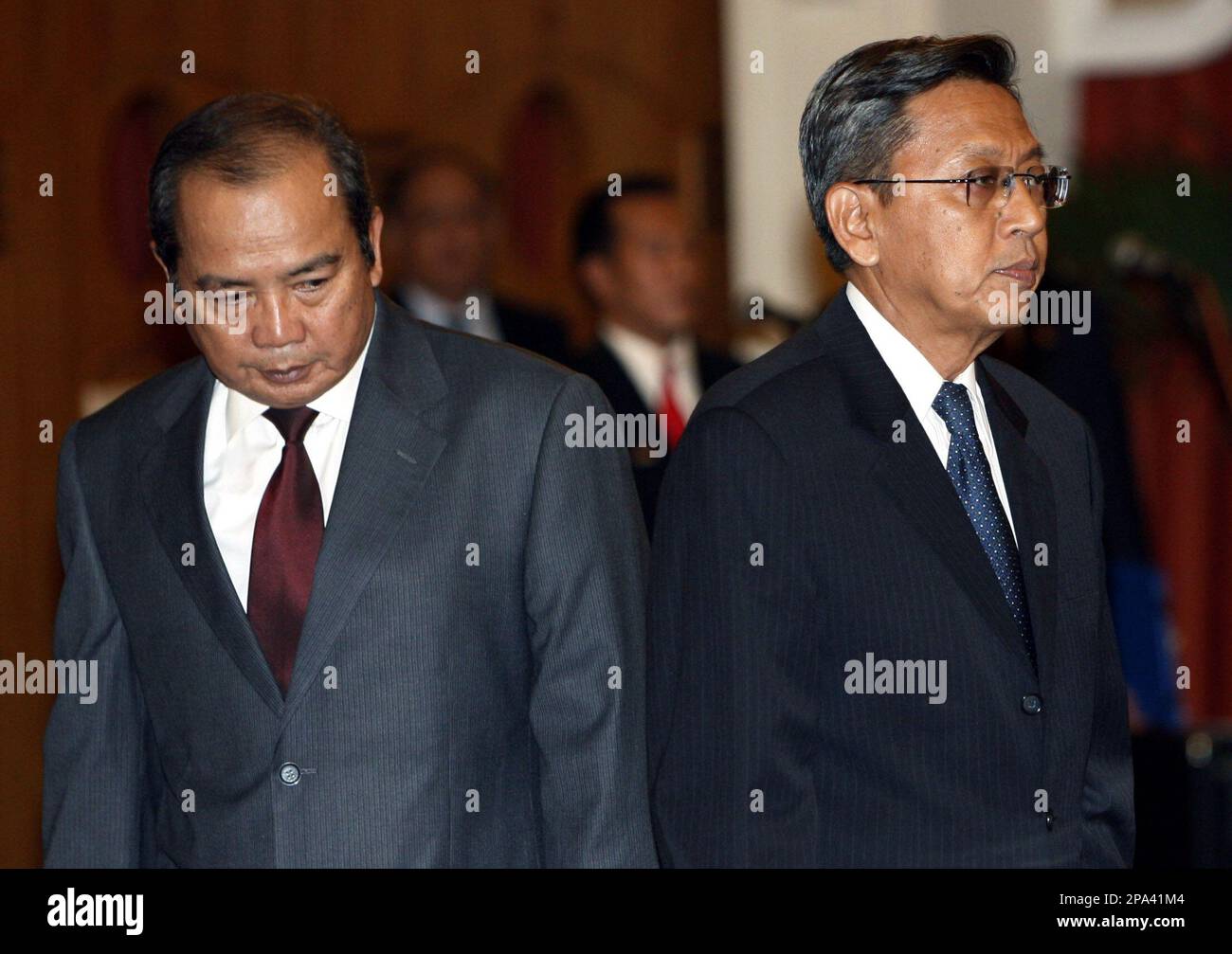 The new Governor of Indonesia's central bank Boediono, right, and his ...