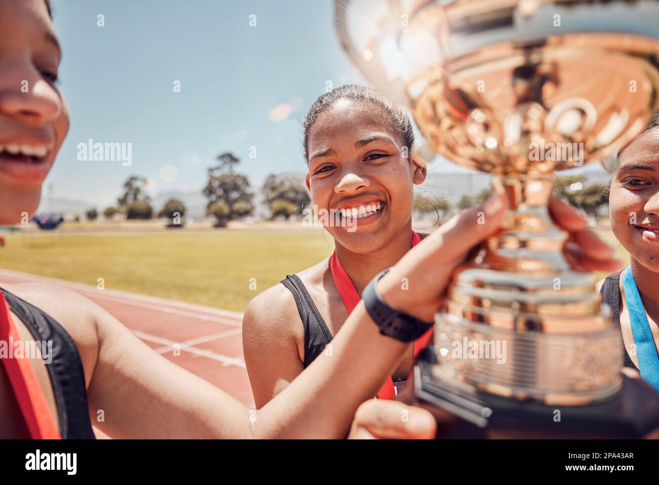 Winner, trophy and track team celebrate olympic relay teamwork, sprint ...