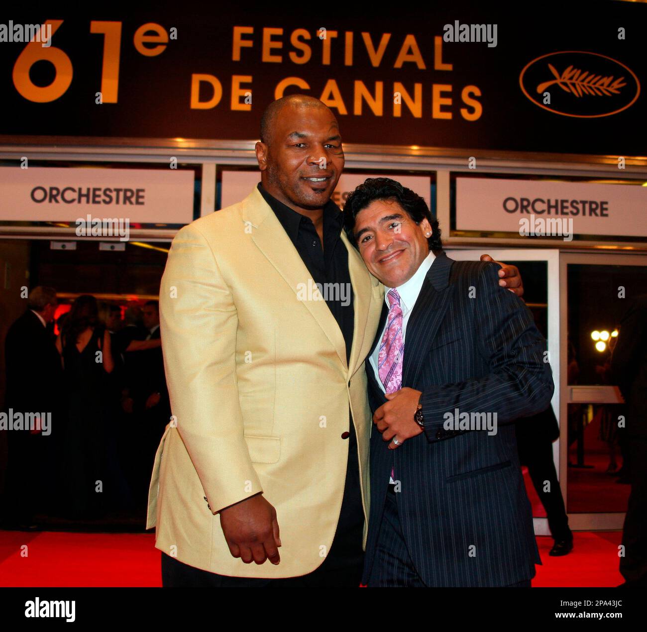 American boxer Mike Tyson, left, and former Argentinean soccer great ...