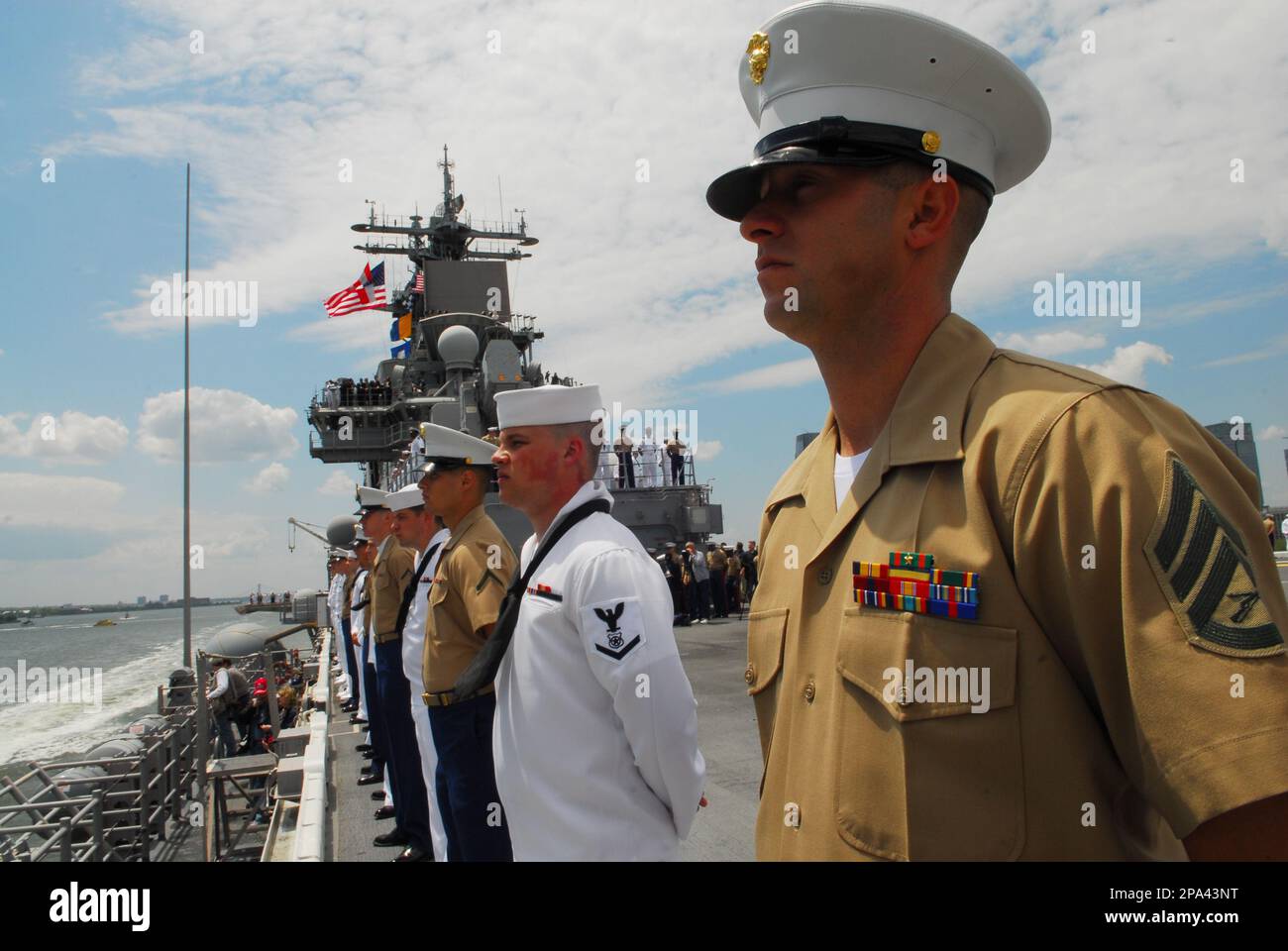 Sailors and Marines "Line the Rails" of the USS Kearsarge, a U.S. Navy ...