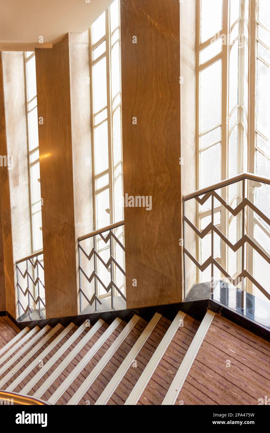 stairwell and leaded windows of art deco interior of former co ...