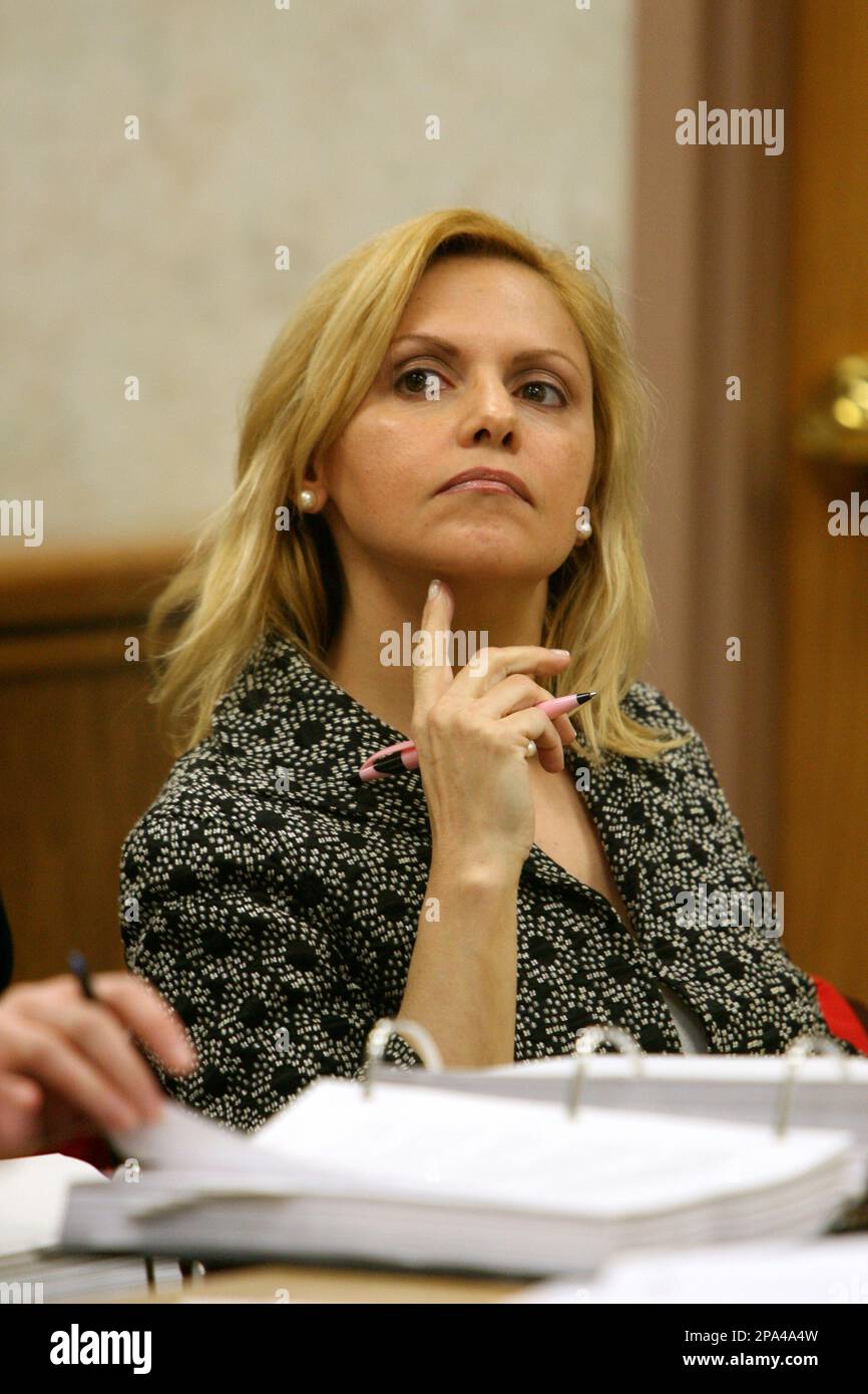 Dina Matos McGreevey looks across the court room as she listens to ...