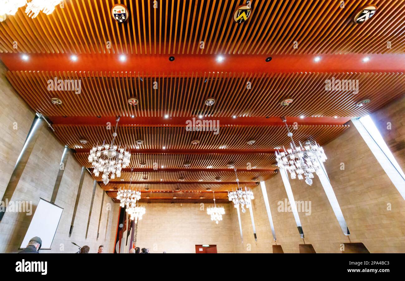 timber slats ceiling and chandeliers mid century modern interior of The ...